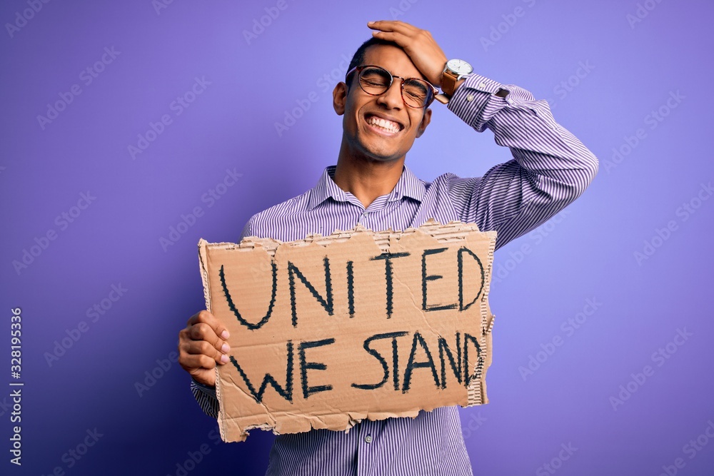 African american activist man asking for union holding banner with ...