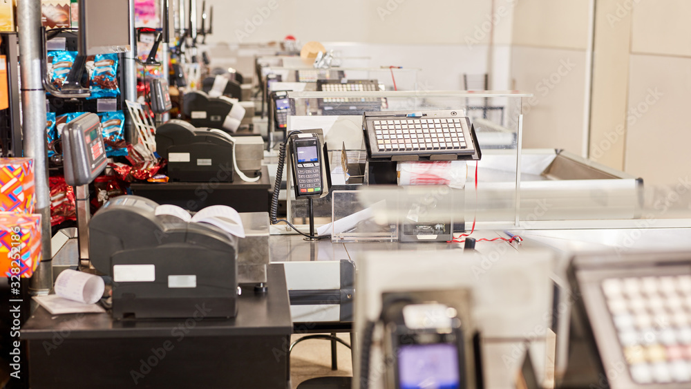 Row of cash registers as scanner cash registers Stock Photo | Adobe Stock