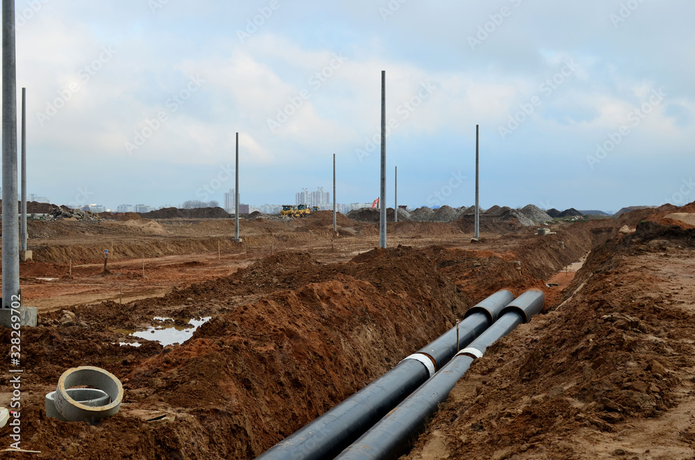Laying underground storm sewers at a construction site. Groundwater ...