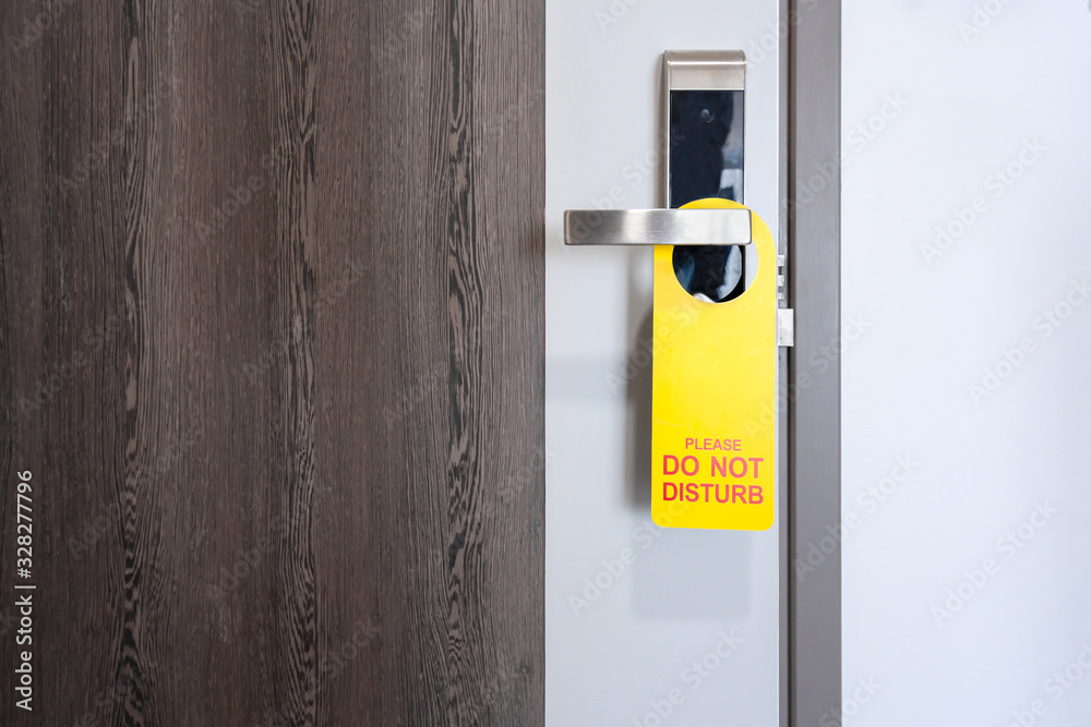 Do not disturb room label tag hotel sign hanging on modern metal ...