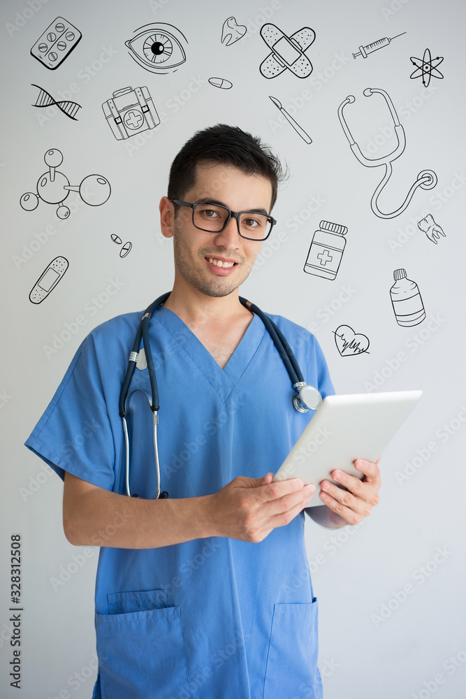 Smart doctor holding tablet with hand drawn medical sketches ...