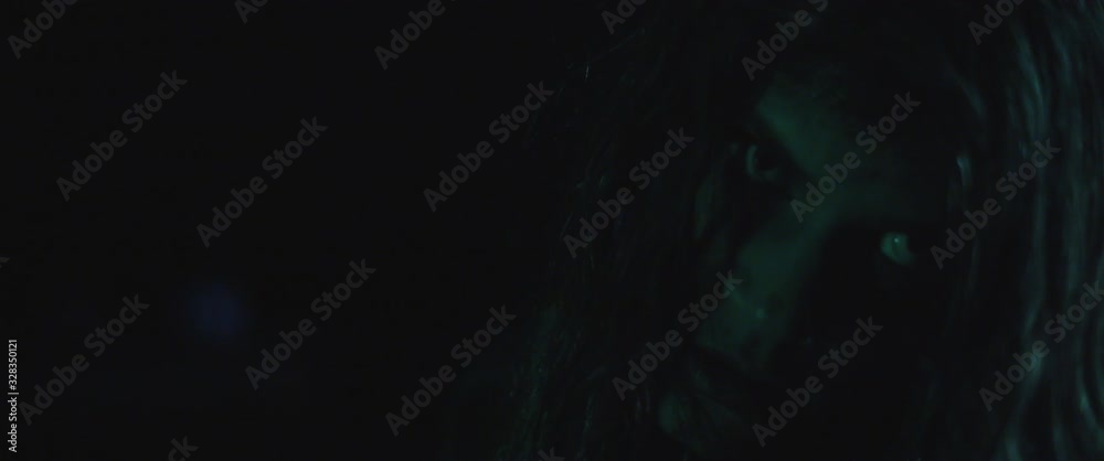 Vidéo Stock Terrifying creepy zombie woman with white eyes and bloody ...