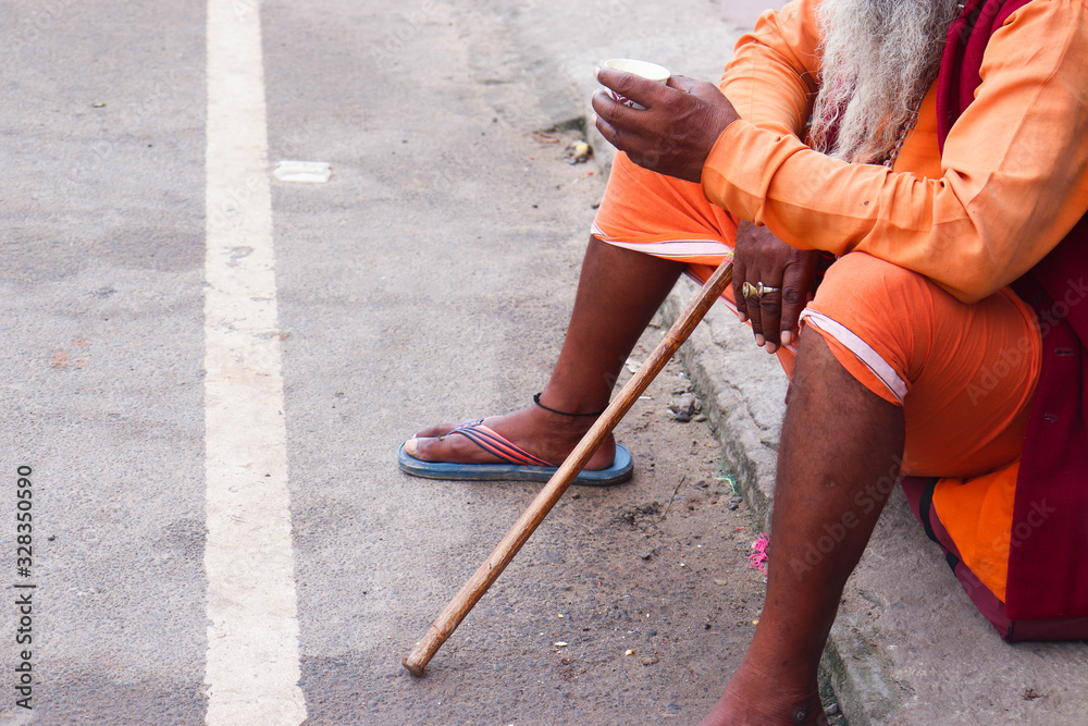 Feet and Hands Holding Tea Cup Of An Indian Holy Religious Sacred ...