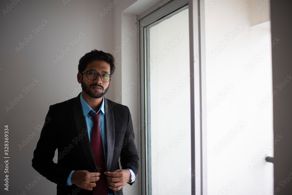 Indian Bengali tall, dark, handsome brunette young man in office wear ...