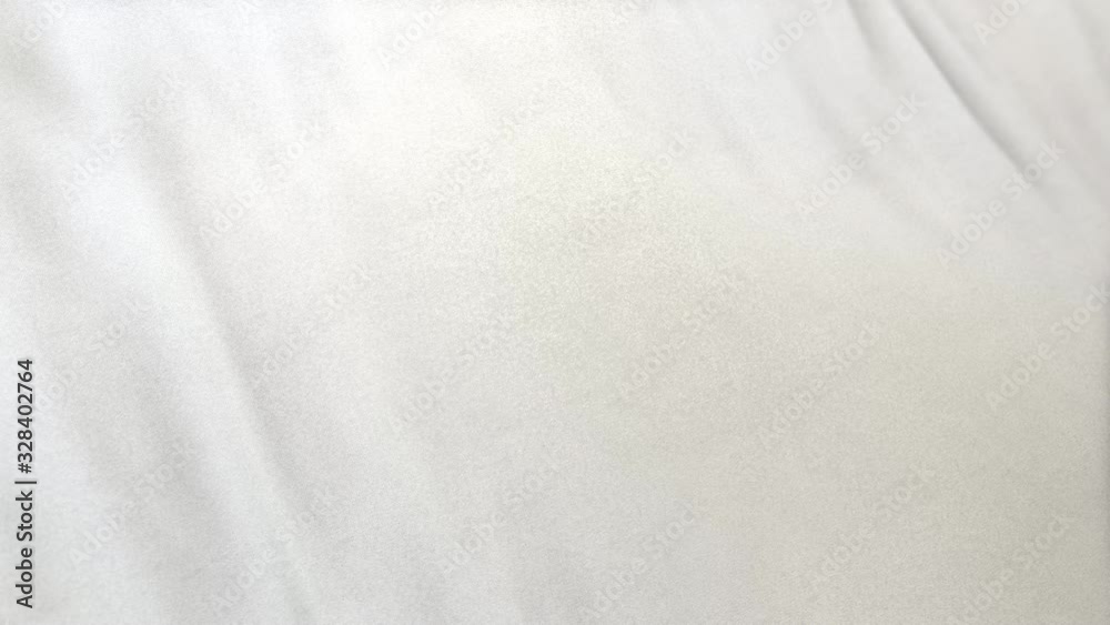 white flag cloth in full frame with selective focus. Seamlessly looping ...