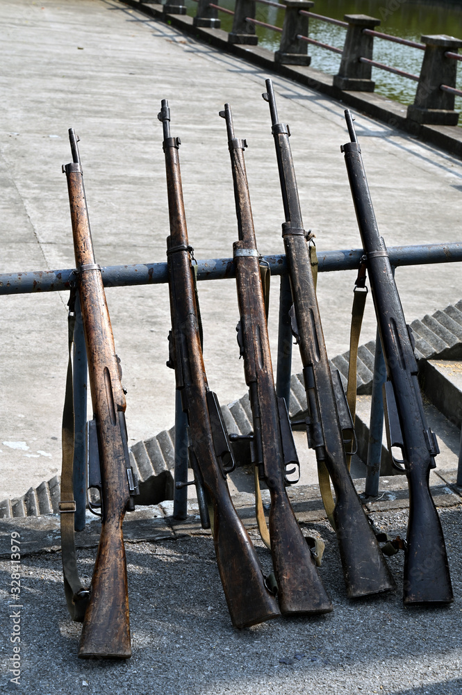 Old guns and props at the scene of film shooting Stock Photo | Adobe Stock