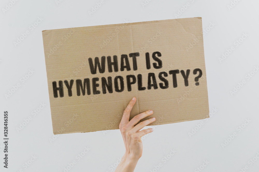 The phrase " What is Hymenoplasty? " on a banner in hand. Human holds a ...