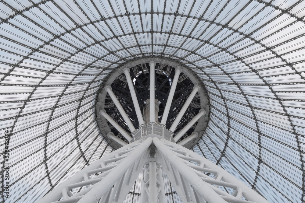 Giant metall colums holding a top of giant conic roof construction ...