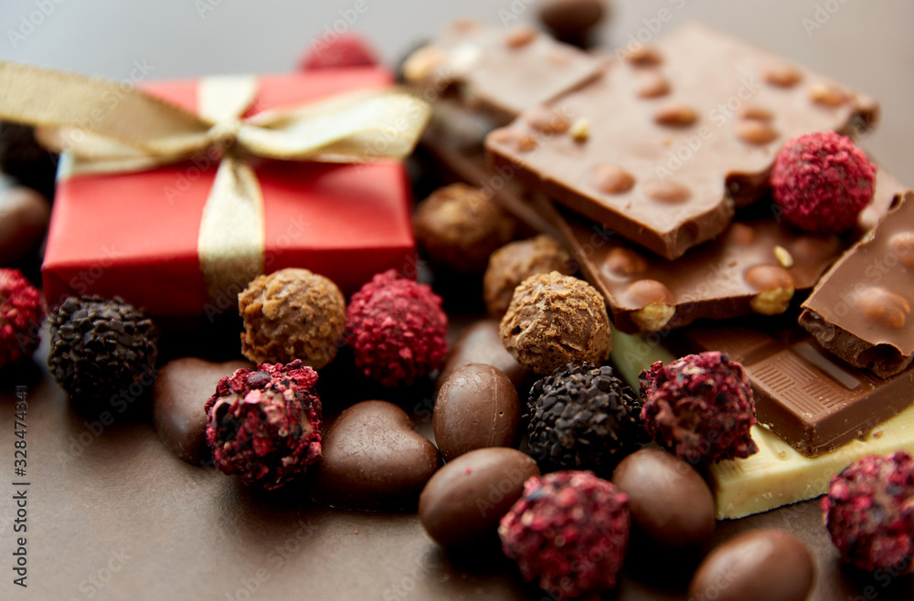 sweets, confectionery and food concept - close up of different ...
