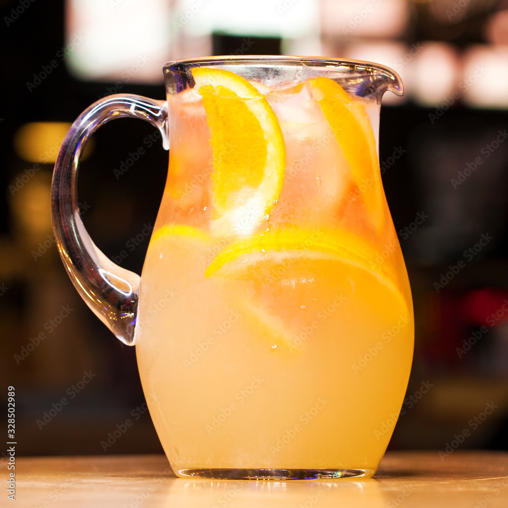 Restaurant dish - soft drink in a jug in dark Stock Photo | Adobe Stock