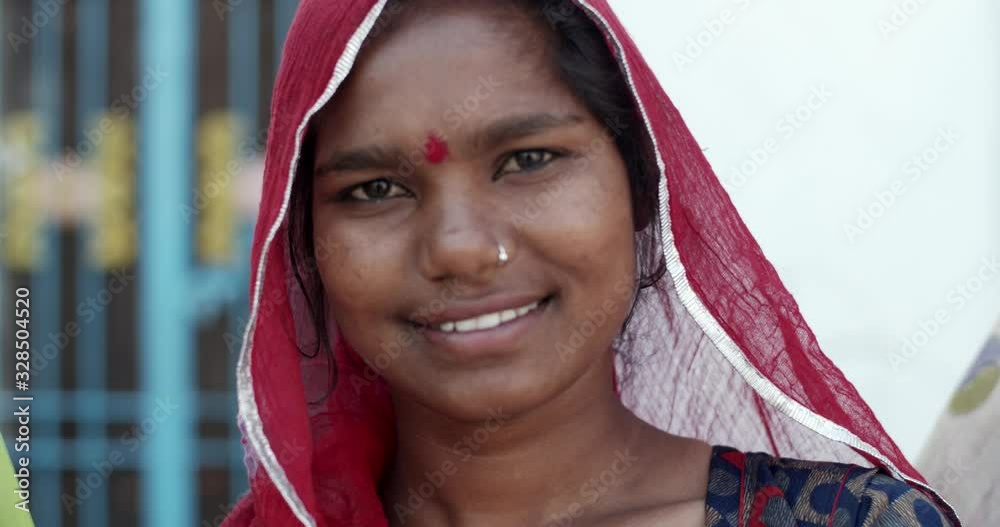 Close-up of an confident positive happy Indian teenage girl wearing ...