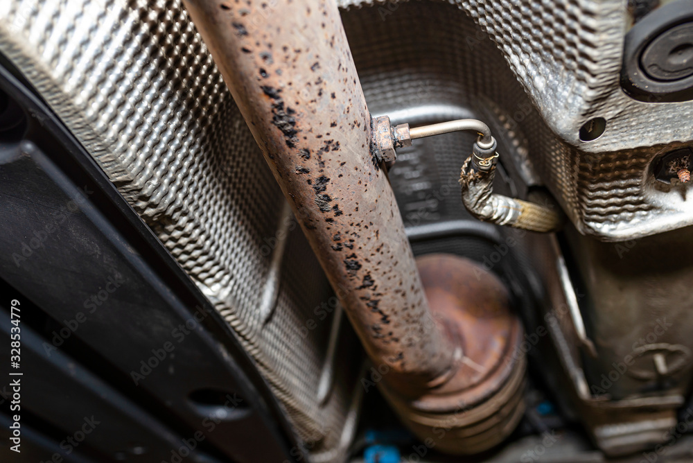 Temperature sensor in the car exhaust system, located behind the diesel ...