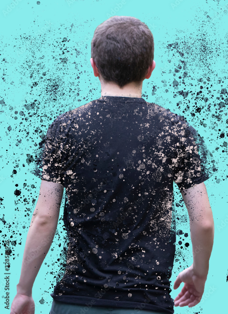 Back side of a pale skinned man with short brown curly hair wearing a ...