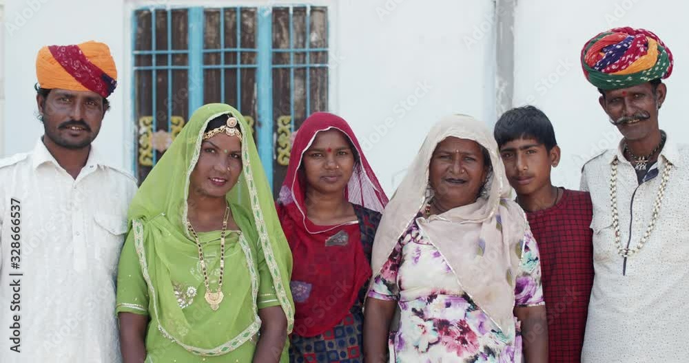 Portrait medium mid shot ms of three generations of a rural family in ...
