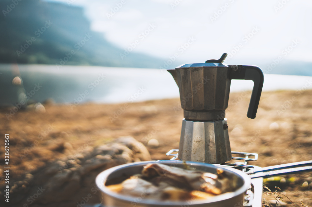 moka pot coffee outdoor in lake, campsite morning picnic lifestyle ...