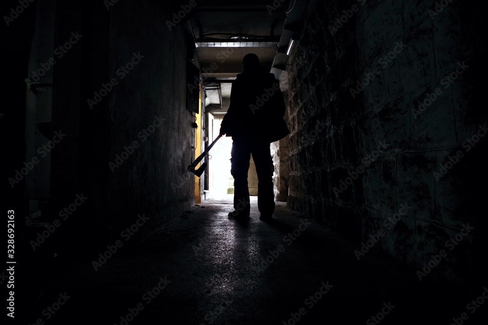 A Hallway With A Shadow