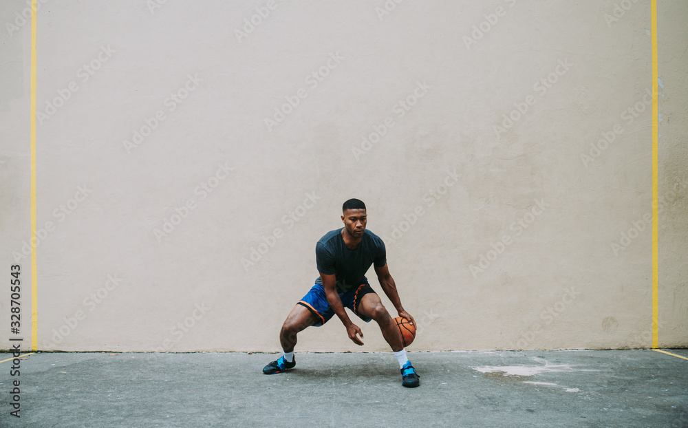Basketball player training on a court in New york city Stock Photo ...