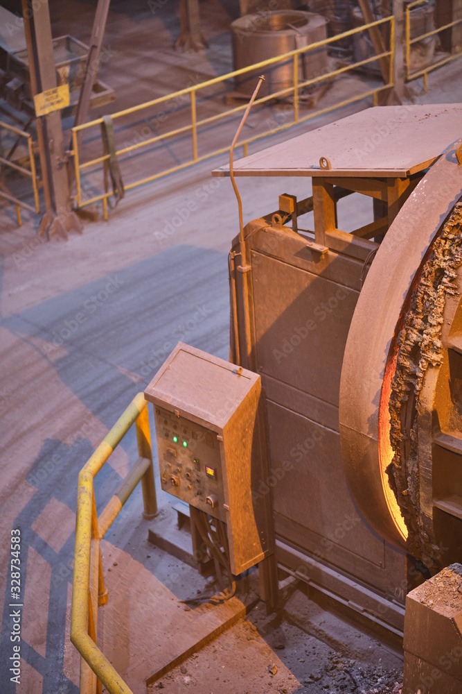 Melting of metal in a steel plant. High temperature in the melting ...