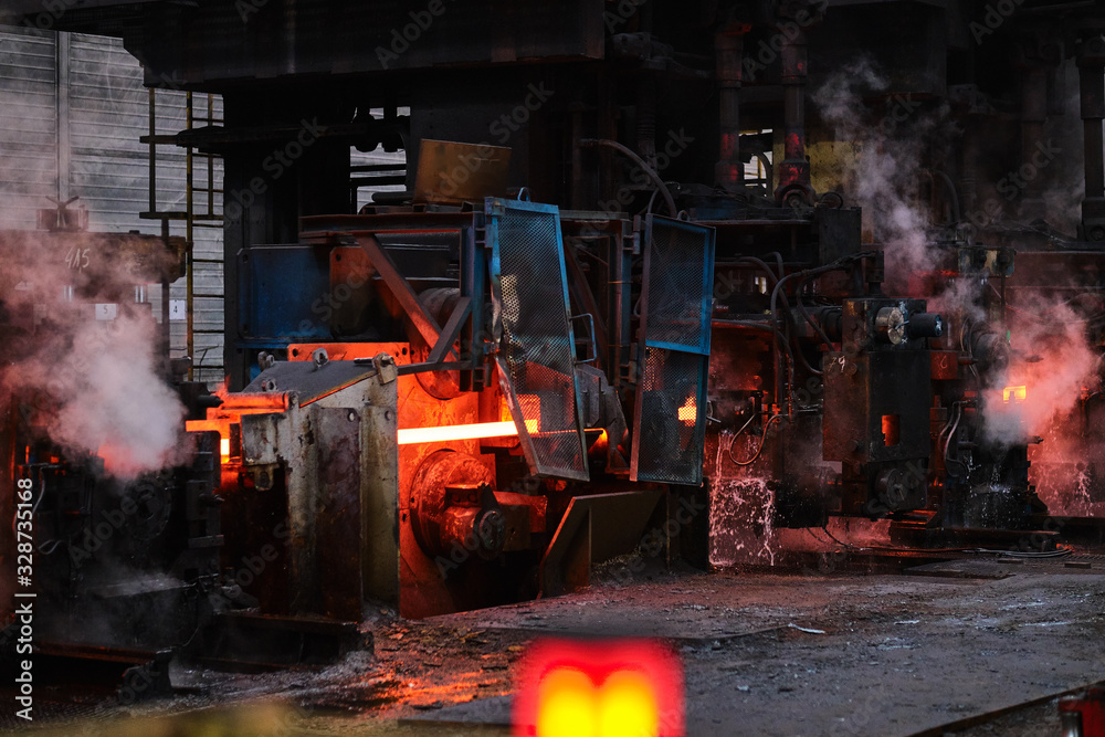 Melting of metal in a steel plant. High temperature in the melting ...