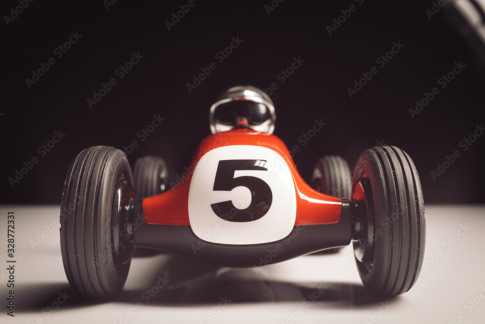 Red old racing car with number five painted on it Stock Photo | Adobe Stock