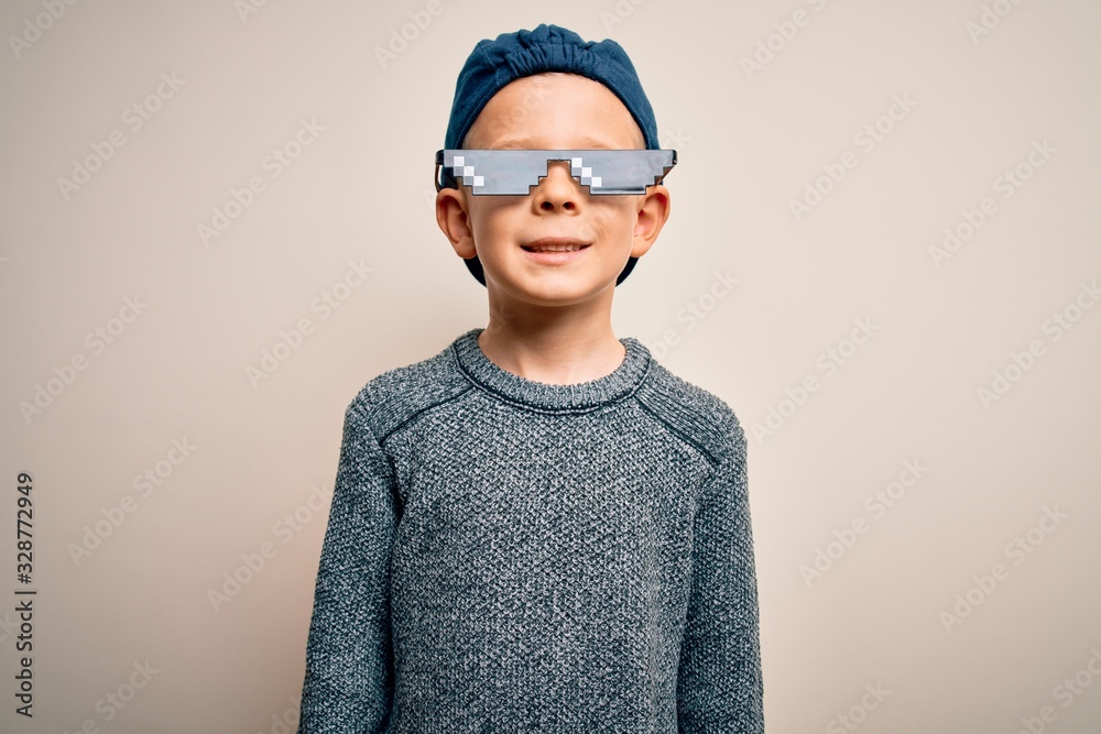 Young little caucasian kid wearing internet meme thug life glasses over ...