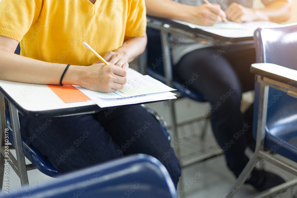 high school,university student study.hands holding pencil writing paper ...
