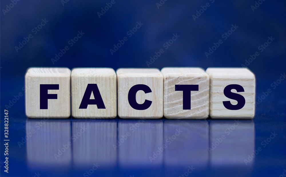 concept word facts on cubes on a blue background Stock Photo | Adobe Stock