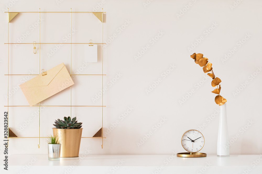 Stylish desk interior with White table background with plant and leaves ...