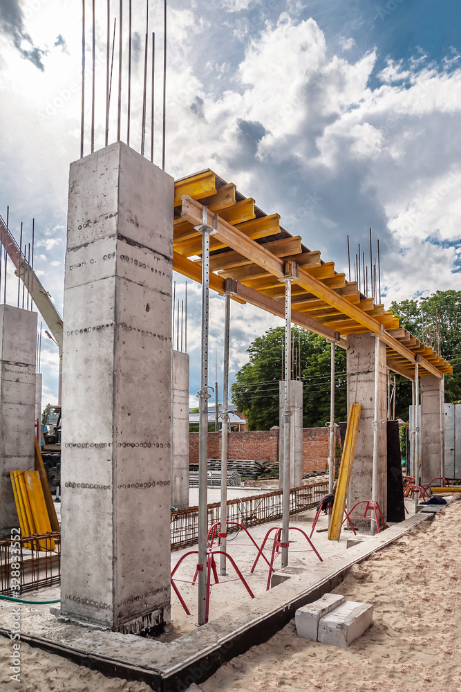 Concrete columns and props in construction Stock Photo | Adobe Stock