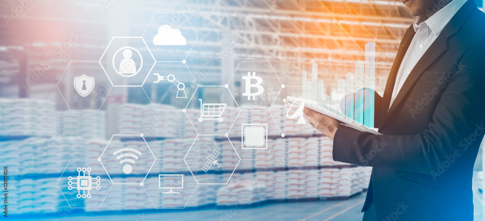 Worker hands holding tablet on blurred warehouse as background .Smart ...