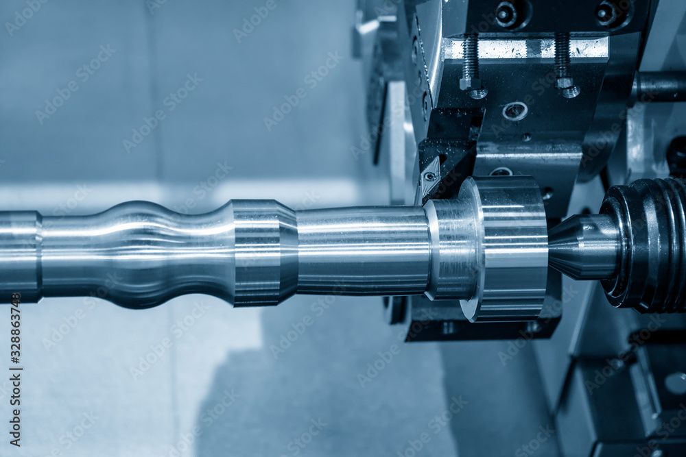 Zdjęcie Stock: The CNC lathe machine in metal working process forming ...