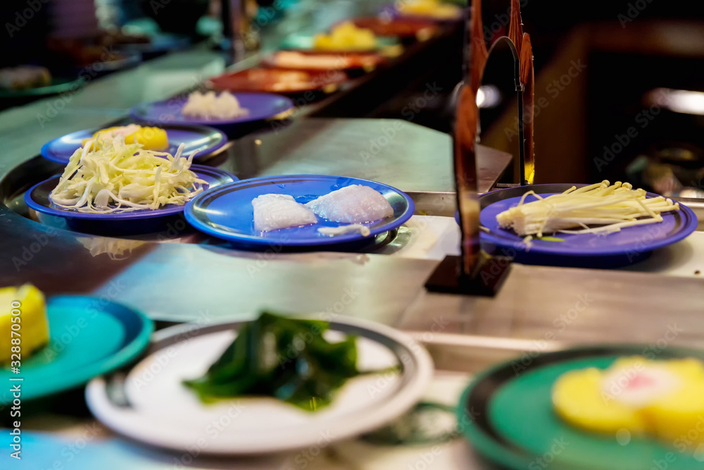Japan restaurant food conveyor or belt buffet. belt sushi in japan ...
