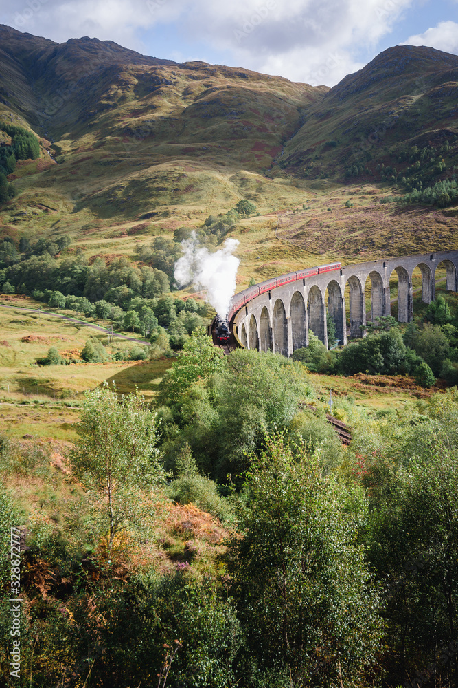 The Hogwarts Express train on the Glenfinnan Viaduct in the Scottish ...