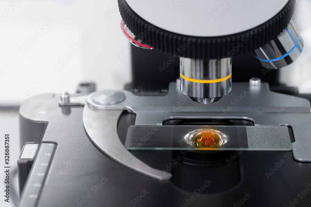compound microscope with glass sample slide for medical health science ...