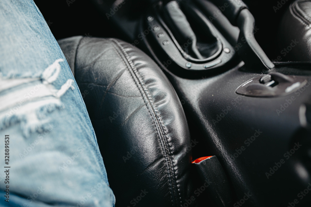 leather black interior of a luxury car. handmade leather upholstery ...