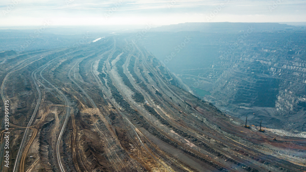 An open-cast mine quarry using an open-pit mining of ore type according ...