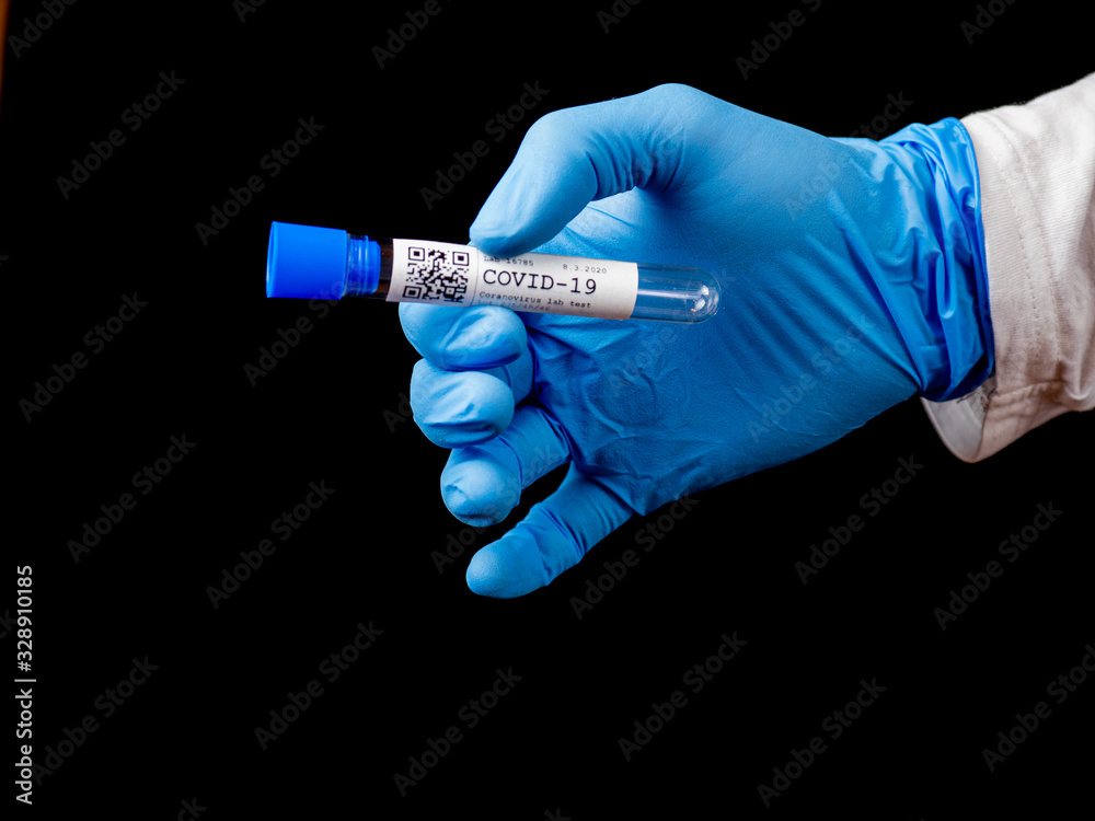 Test tube sample COVID-19 test in hand or researcher in rubber glove on ... Test tube sample COVID-19 test in hand or researcher in rubber glove on ...