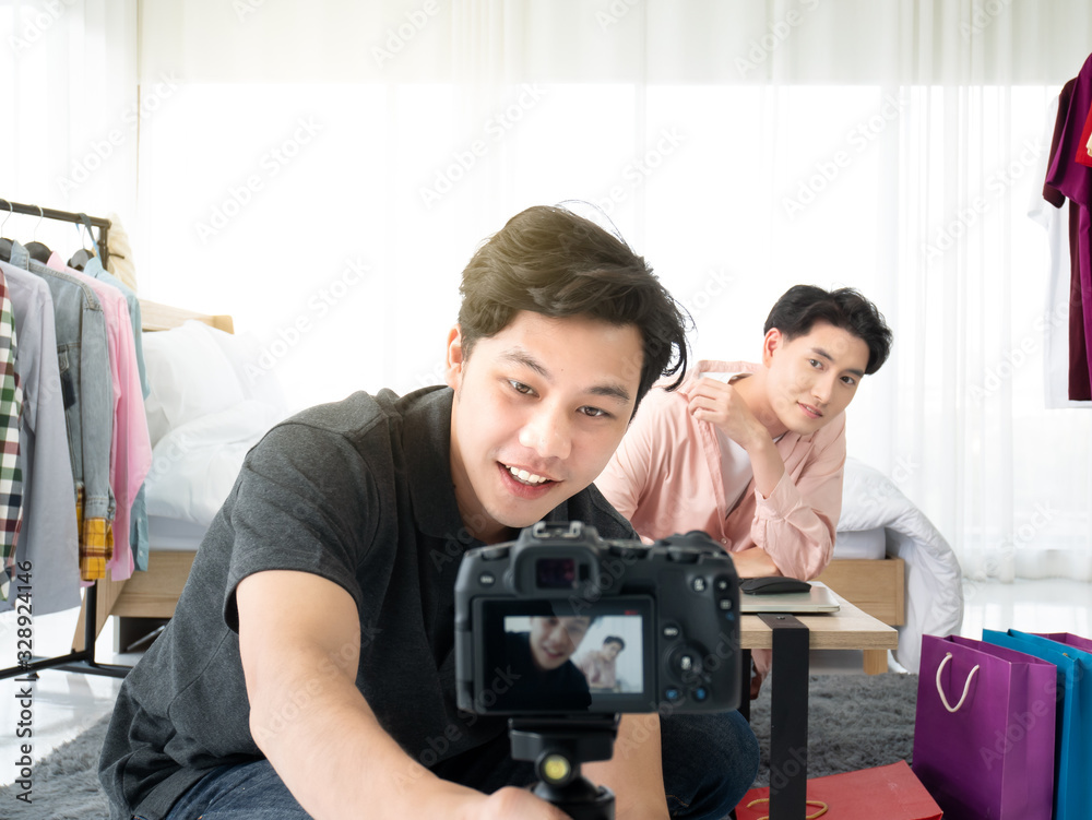 Asian two youth vlogger guy setup DSLR camera to prepare record live ...