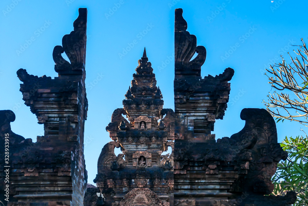 A close up on an entrance gate to a Hindu temple on Bali, Indonesia The ...