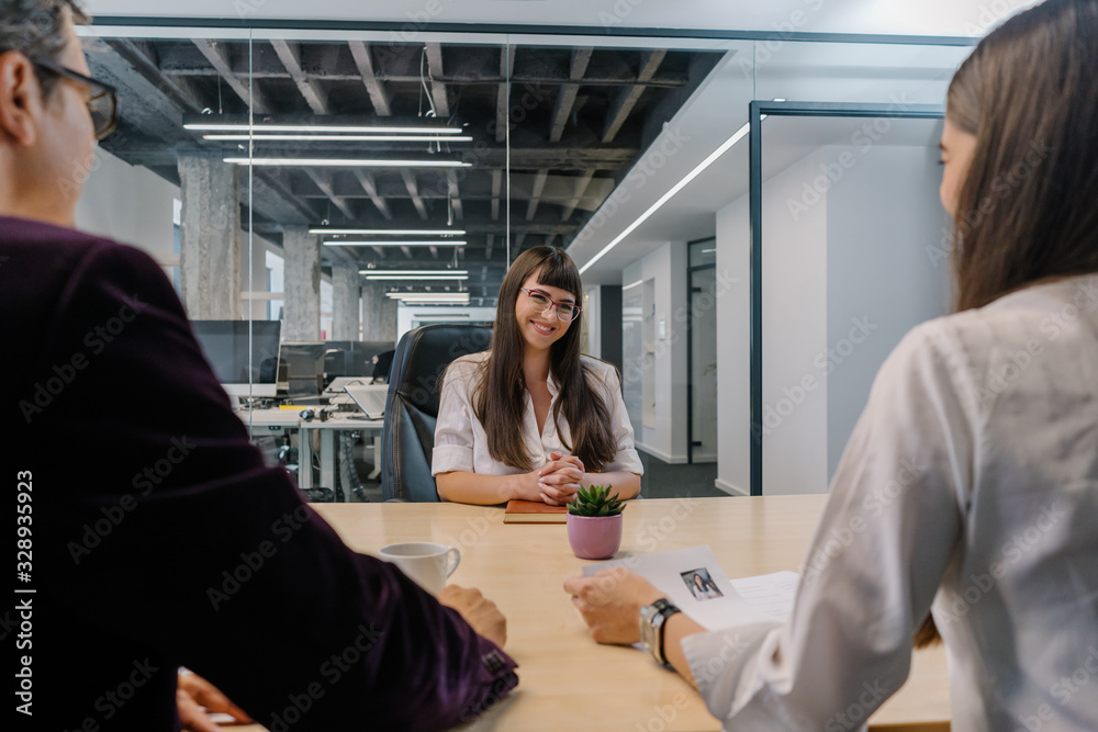 Charming young job applicant trying to make a good first impression at ...