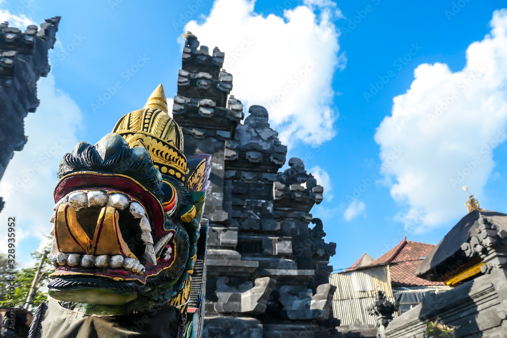A colourful dragon wearing a crown at entrance gate to Tanah Lot temple ...