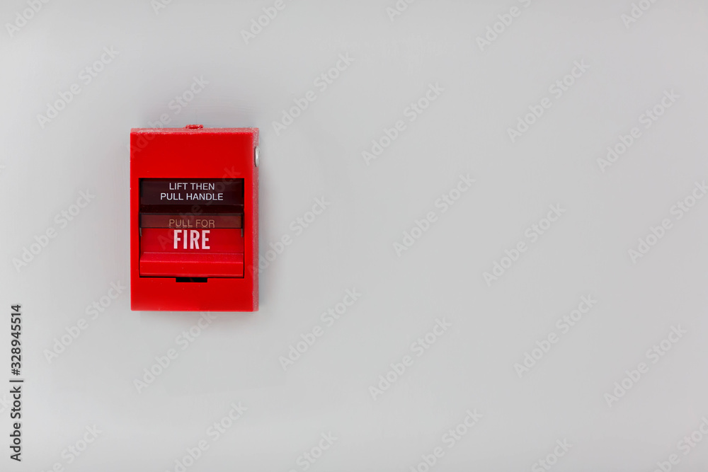 Fire alarm box on cement wall for warning and security system in the ...