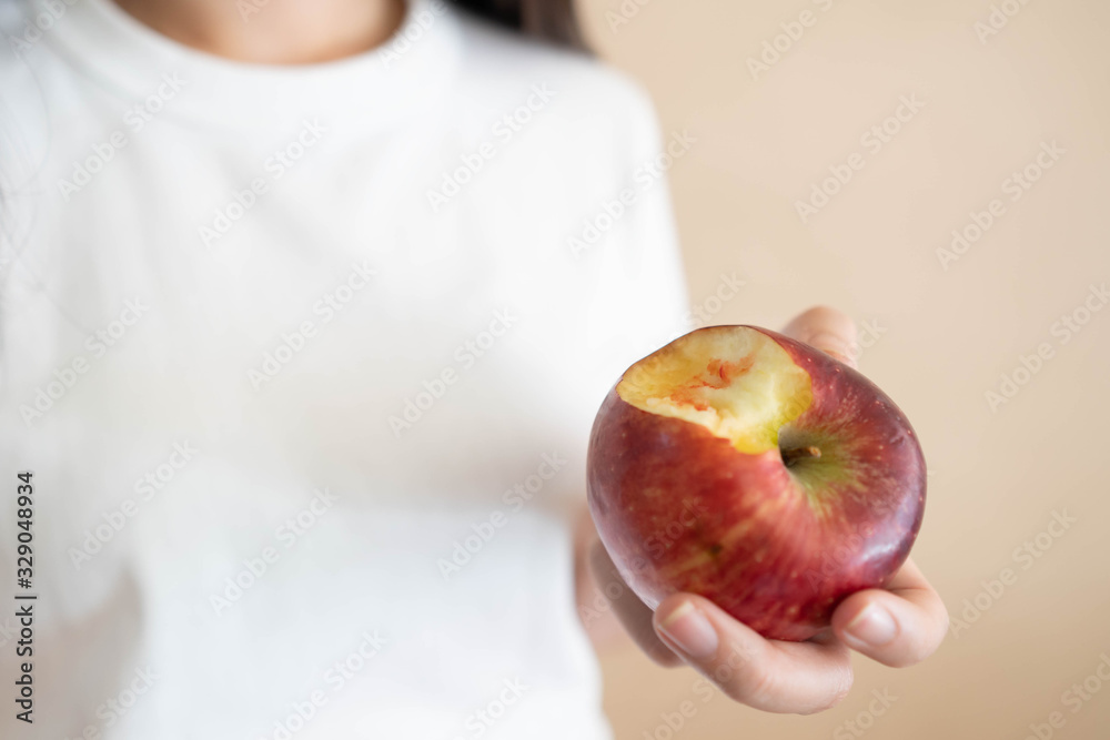 Woman have bleeding gums after biting an apple. Bleeding gums are a ...