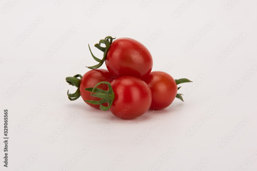 The cherry tomato is a type of small round tomato believed to be an ...