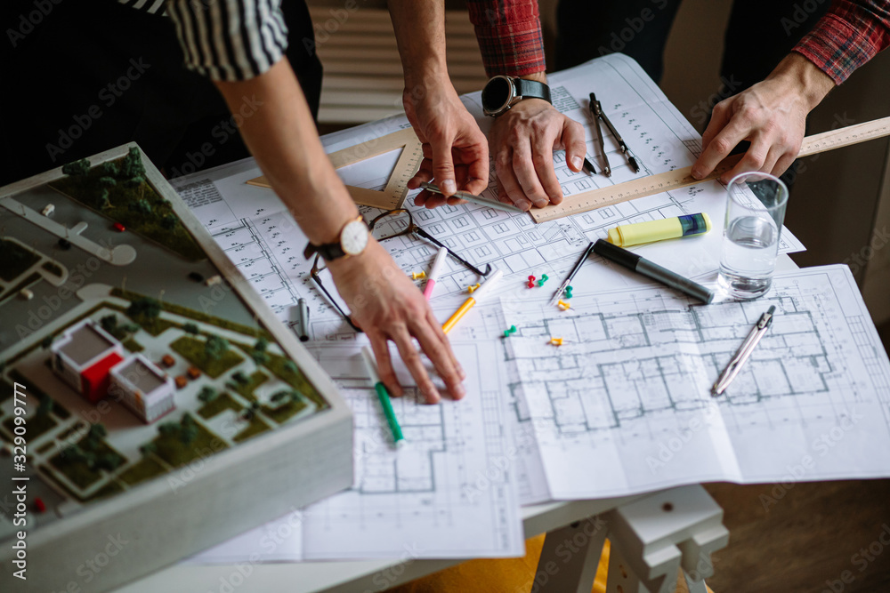 young experts, professional architects make high-rise building, complex ...