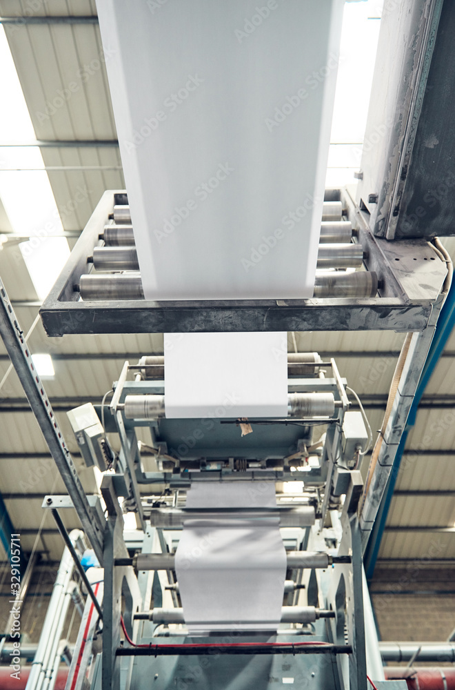 A toilet paper making machine producing toilet and bathroom paper rolls ...