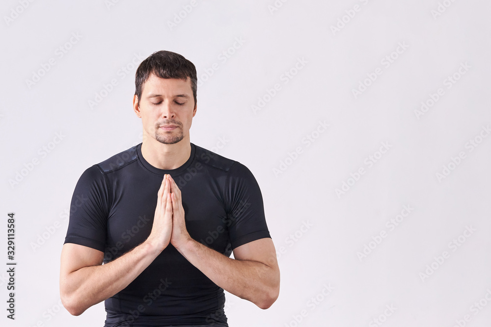 Foto de Man yoga class. Black wear. Calm relax pose. Closed eyes. Zen ...