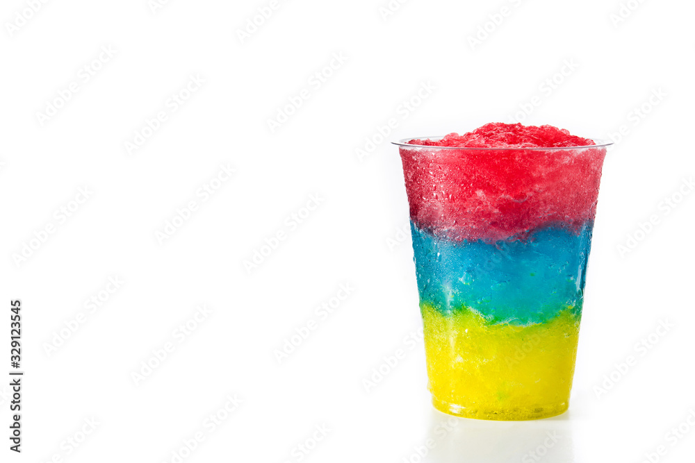 Colorful slushie of differents flavors with straw in plastic cup ...