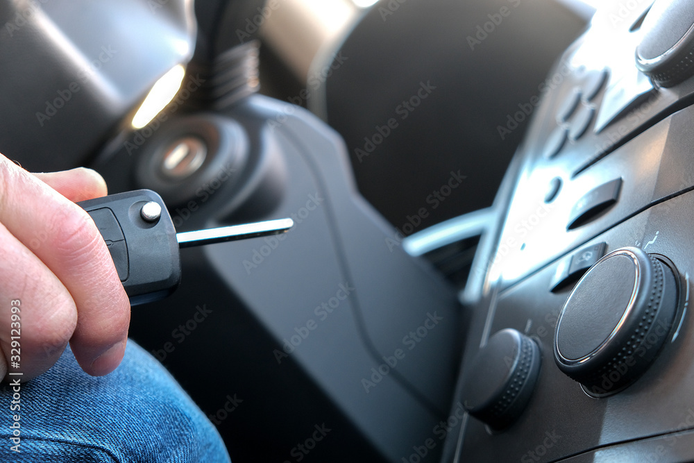 First trip by car. The young drive.r behind the wheel of a car ...