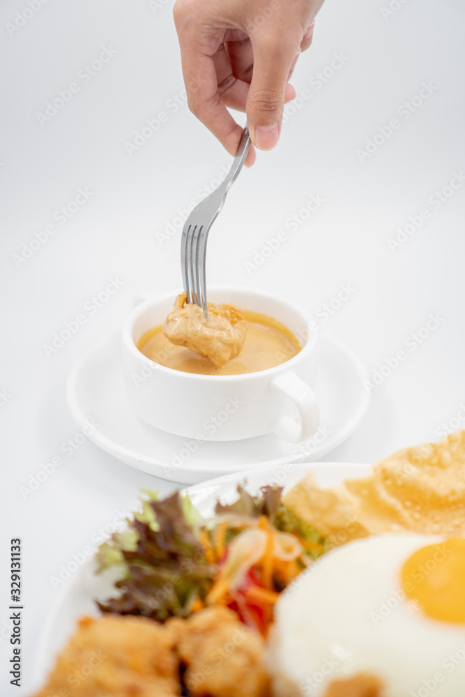 Buttermilk chicken rice with ingredients isolated on white with fried ...
